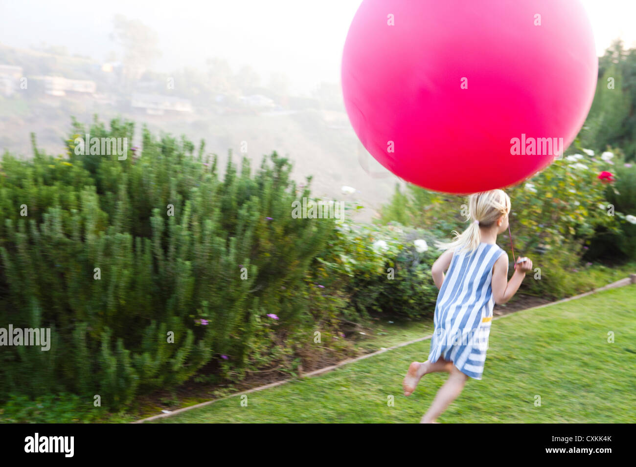 Balloon running hi-res stock photography and images - Alamy