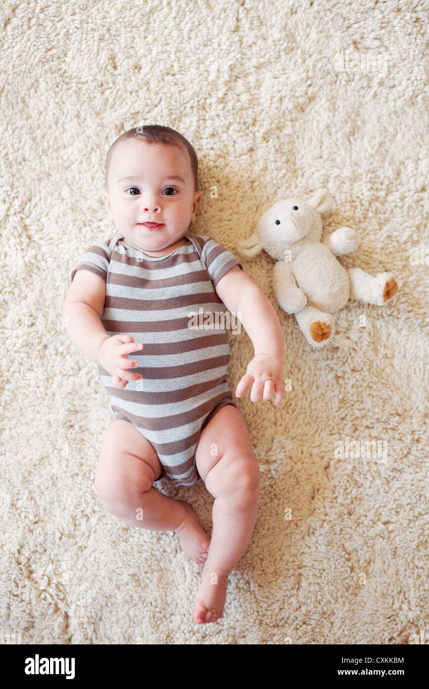 Laying on rug hi-res stock photography and images - Alamy