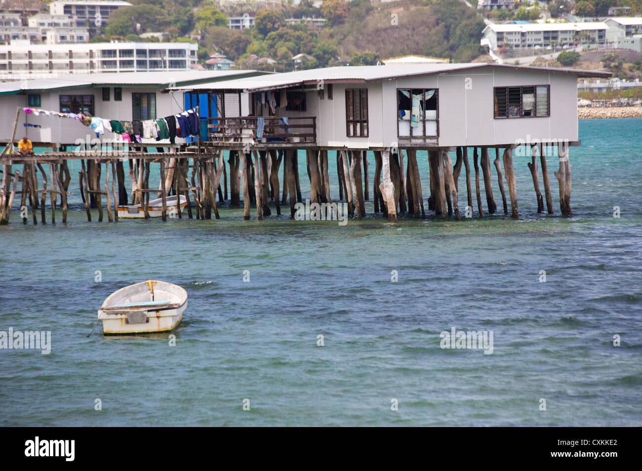 Houses constructed over the sea in the village of Hanoabada, Port ...