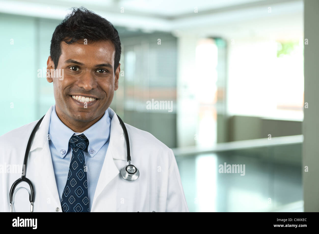 Portrait of a young Indian Doctor Stock Photo - Alamy