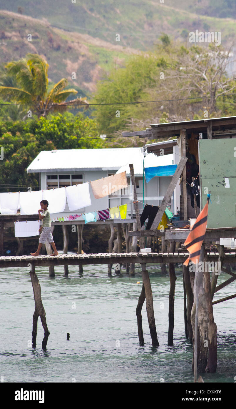 Houses constructed over the sea in the village of Hanoabada, Port ...