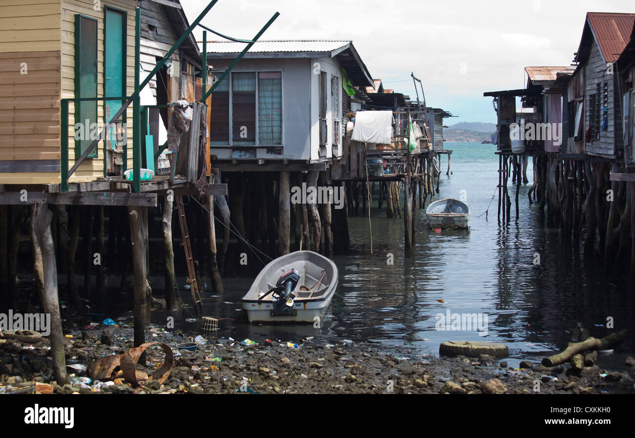 Houses constructed over the sea in the village of Hanoabada, Port ...