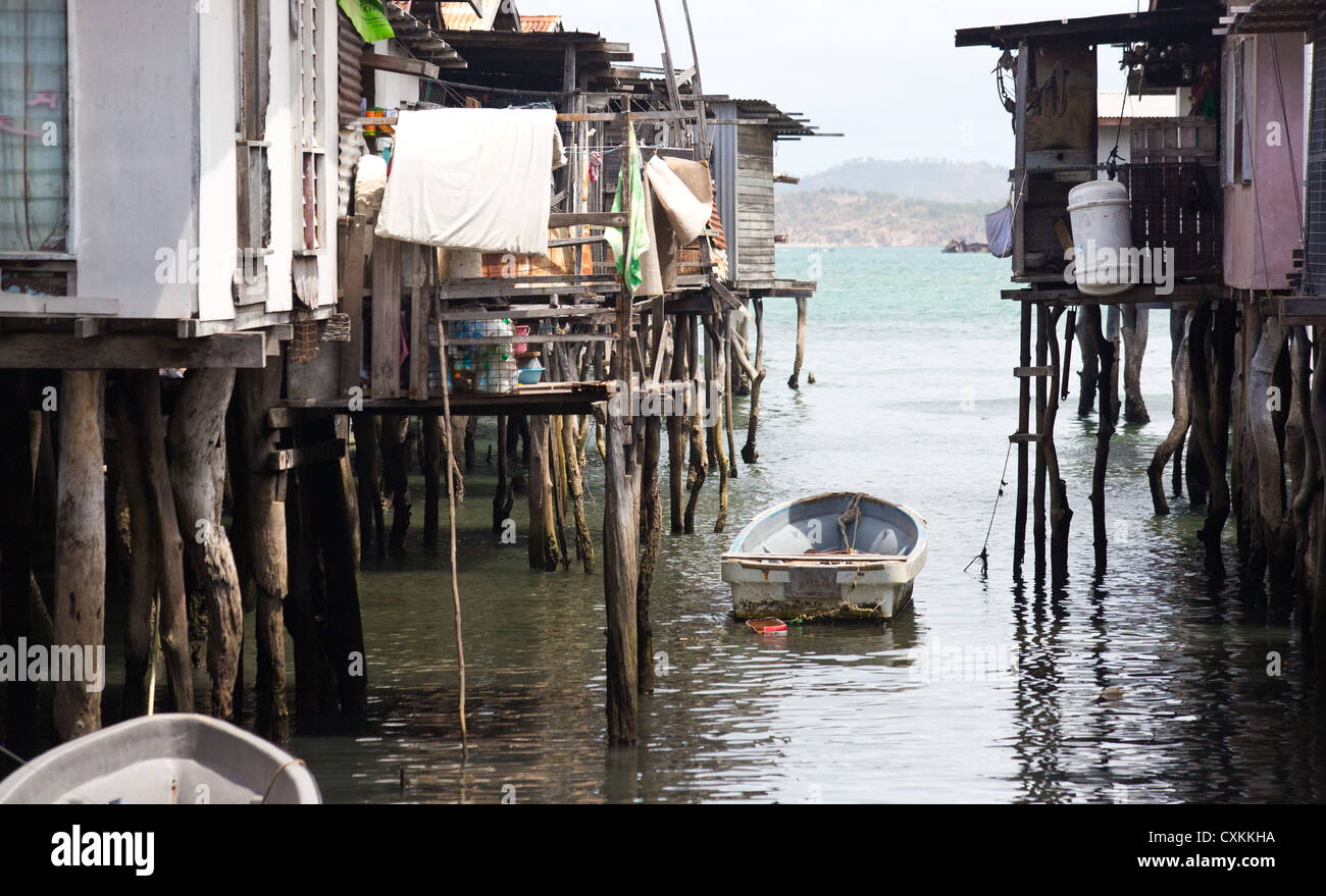 Houses constructed over the sea in the village of Hanoabada, Port ...