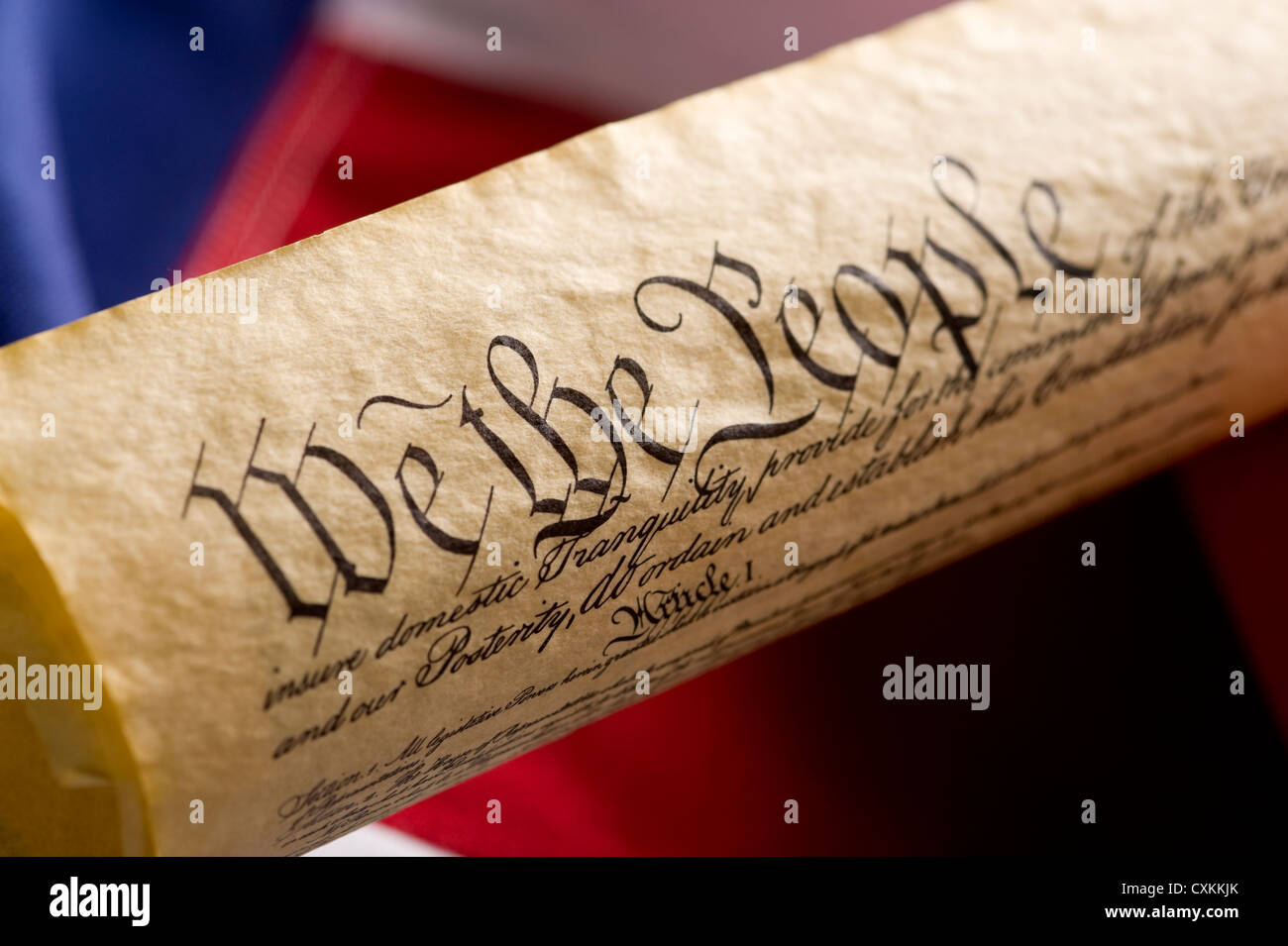 A copy of the United States Constitution on an American Flag Background ...