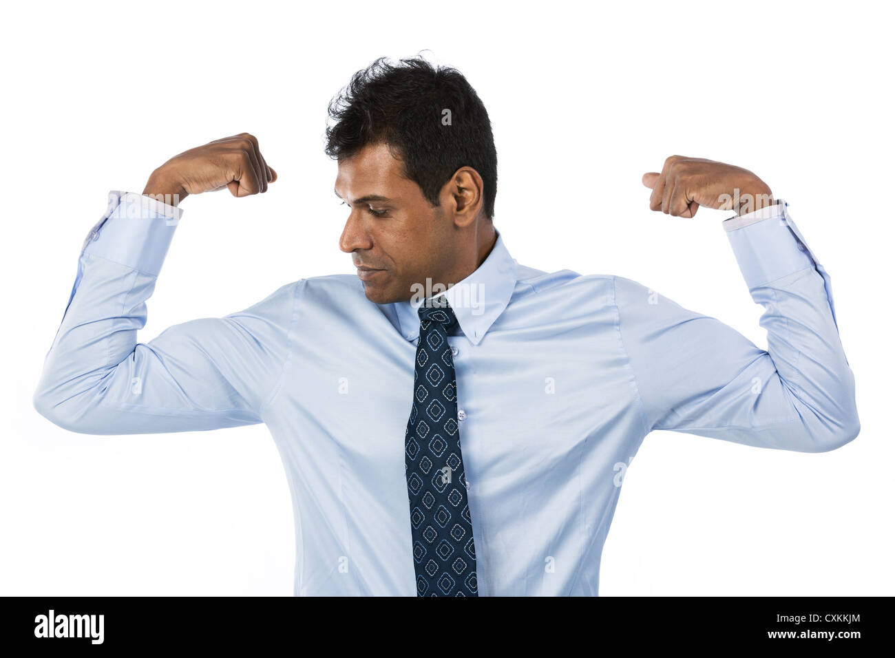 Indian business man flexing his bicep. Concept about power and strength ...
