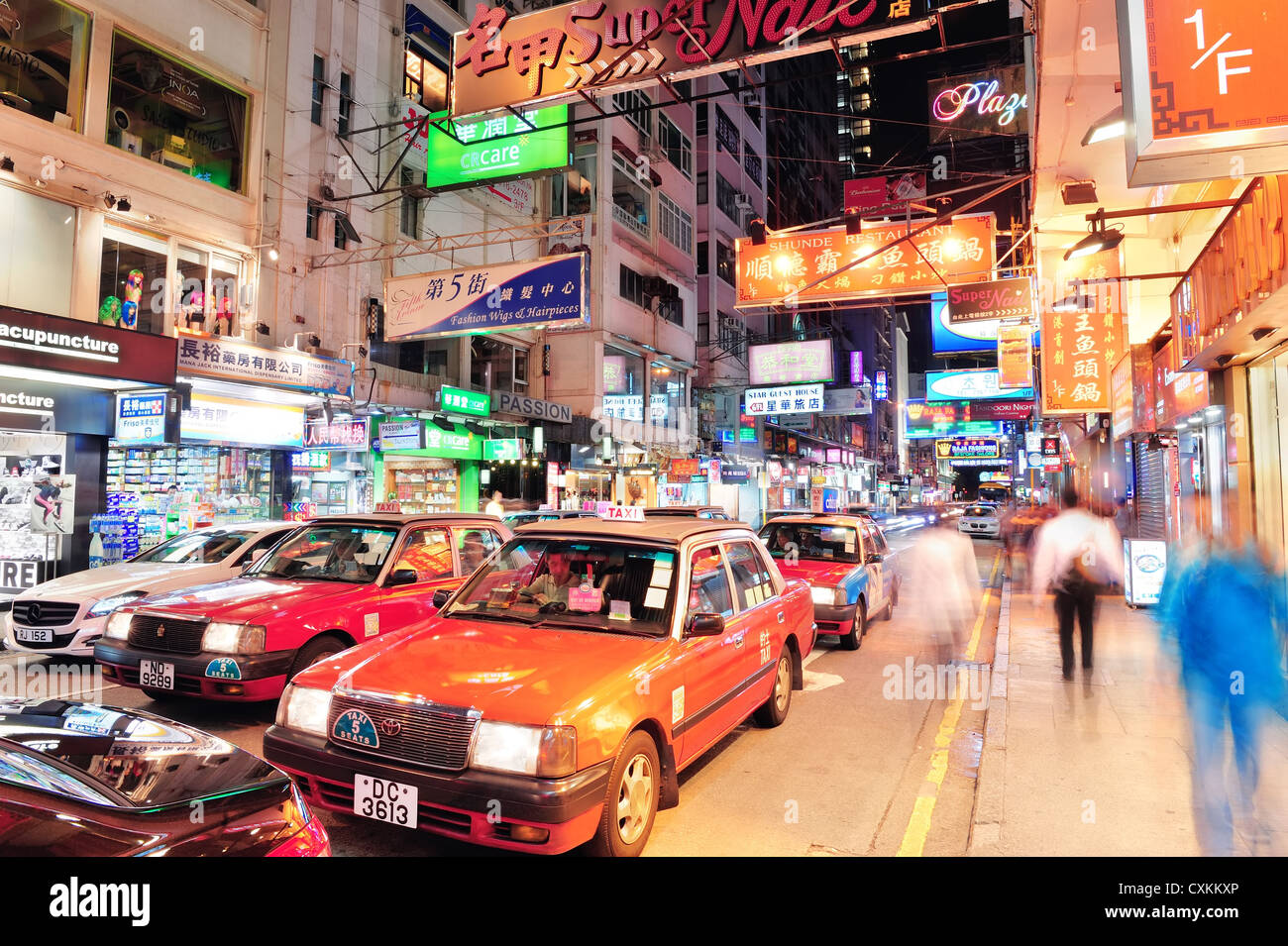 Crowded street view at night Stock Photo - Alamy