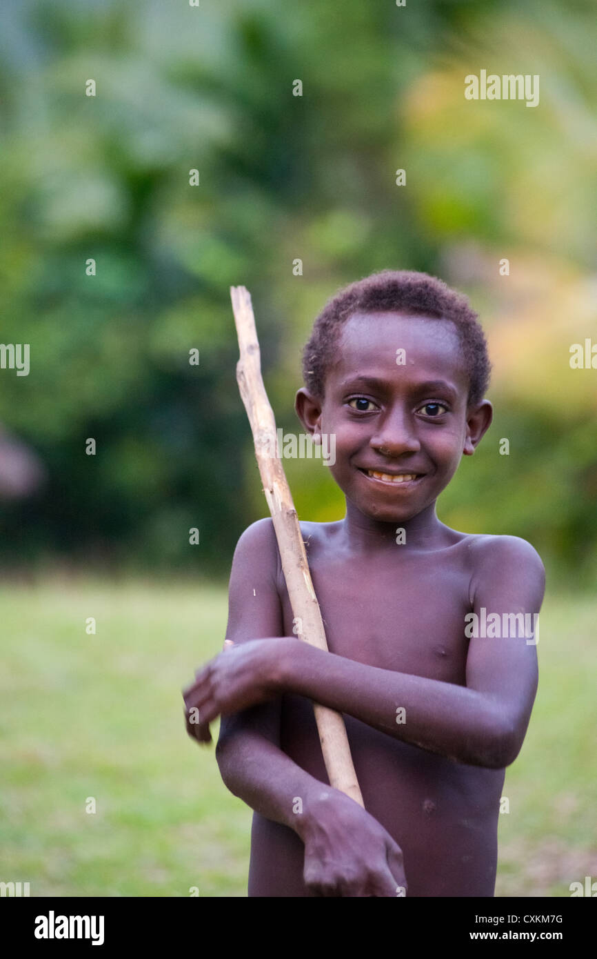 Boy holding a stick hi-res stock photography and images - Alamy