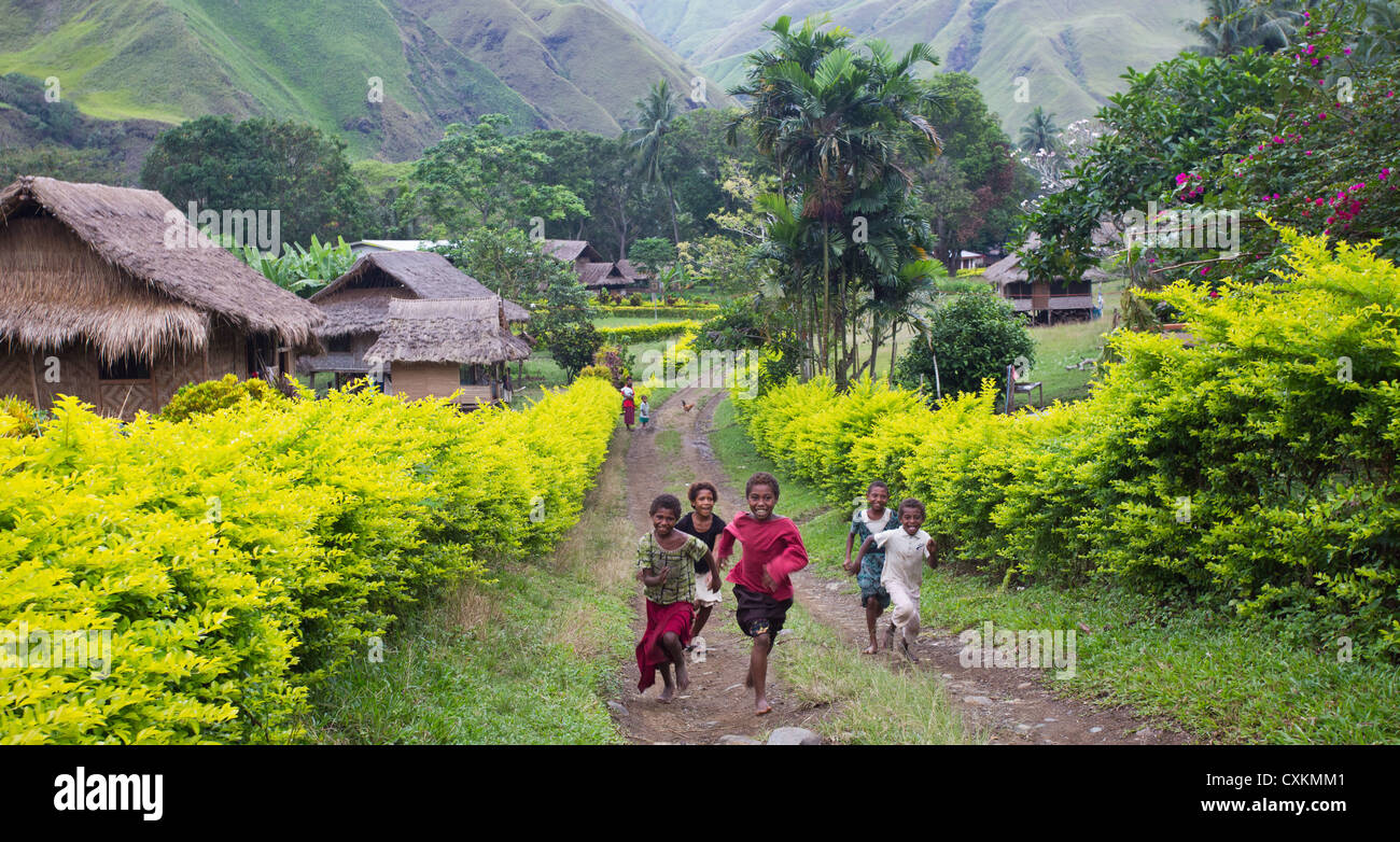 Children running towards camera in a traditional Yonki village, Erap ...