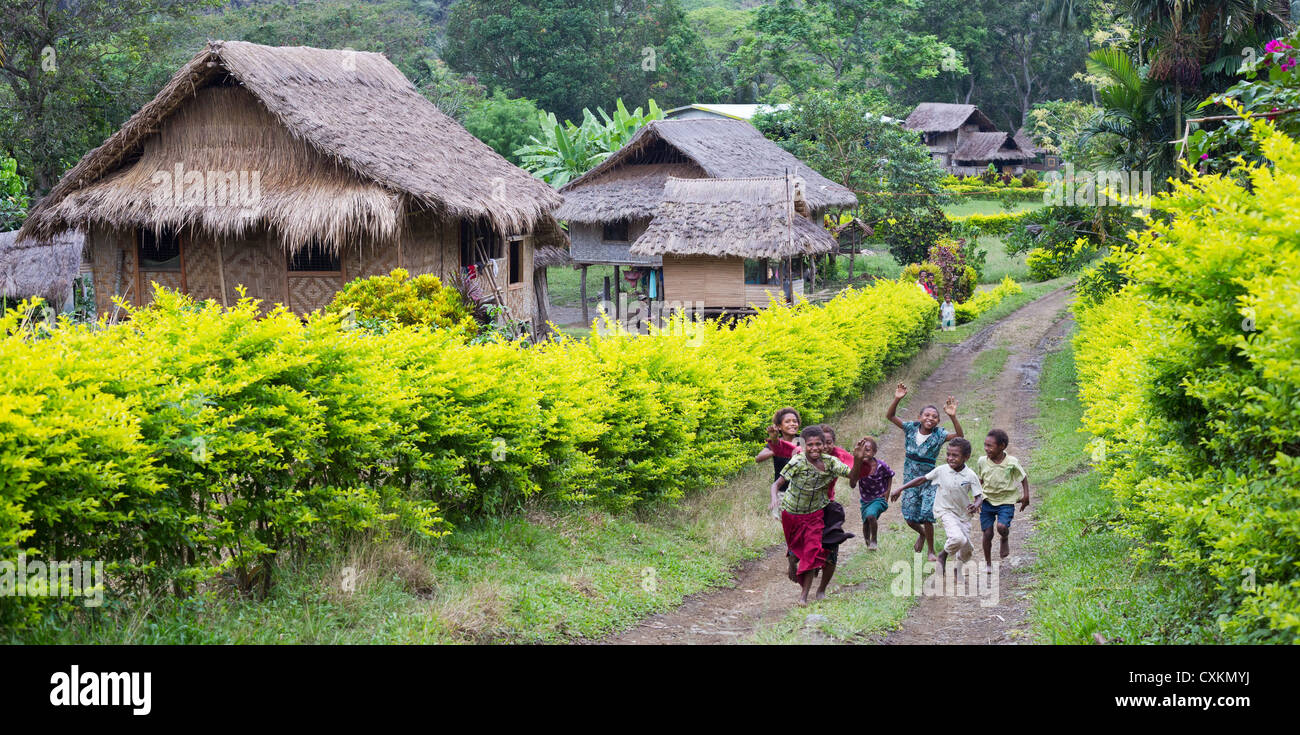 Children running towards camera in a traditional Yonki village, Erap ...