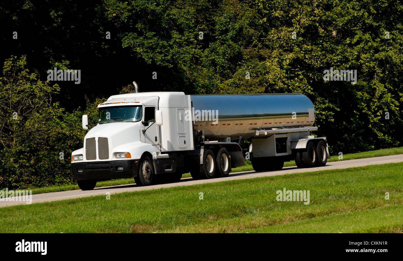 A fuel tanker transport truck on a highway, fuel transportation Stock ...