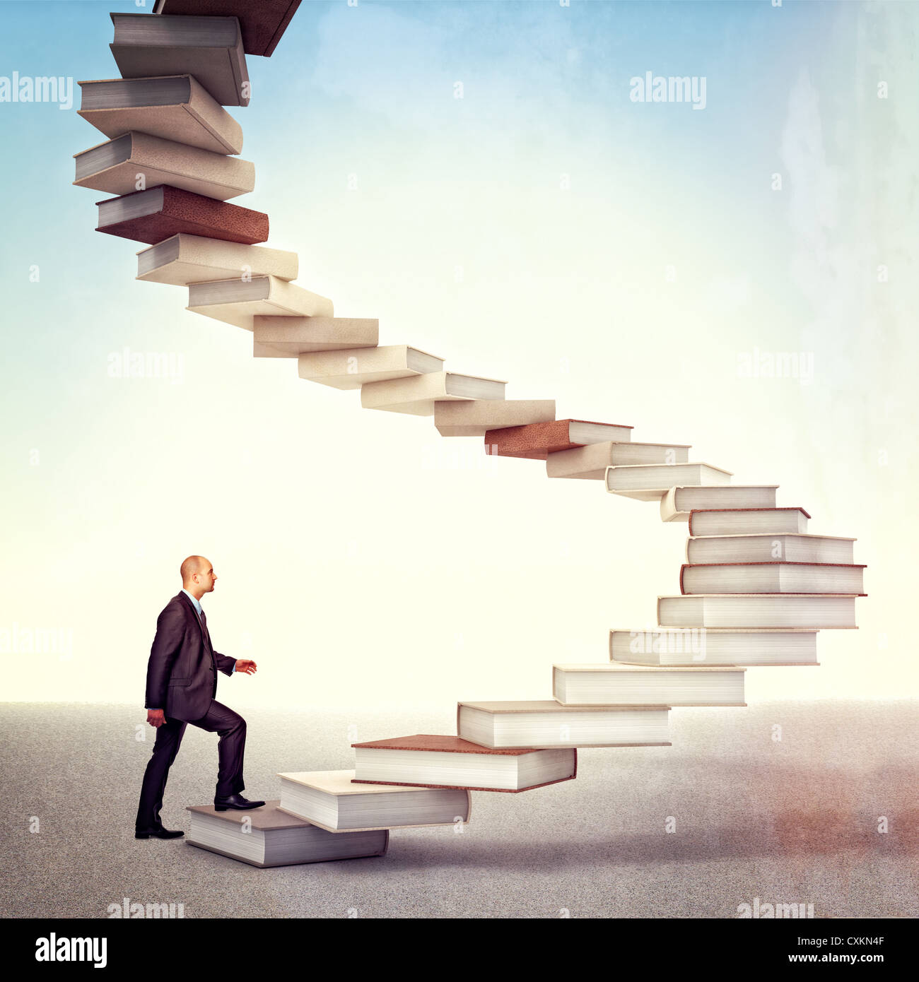 young businessman go up on 3d books stair Stock Photo - Alamy