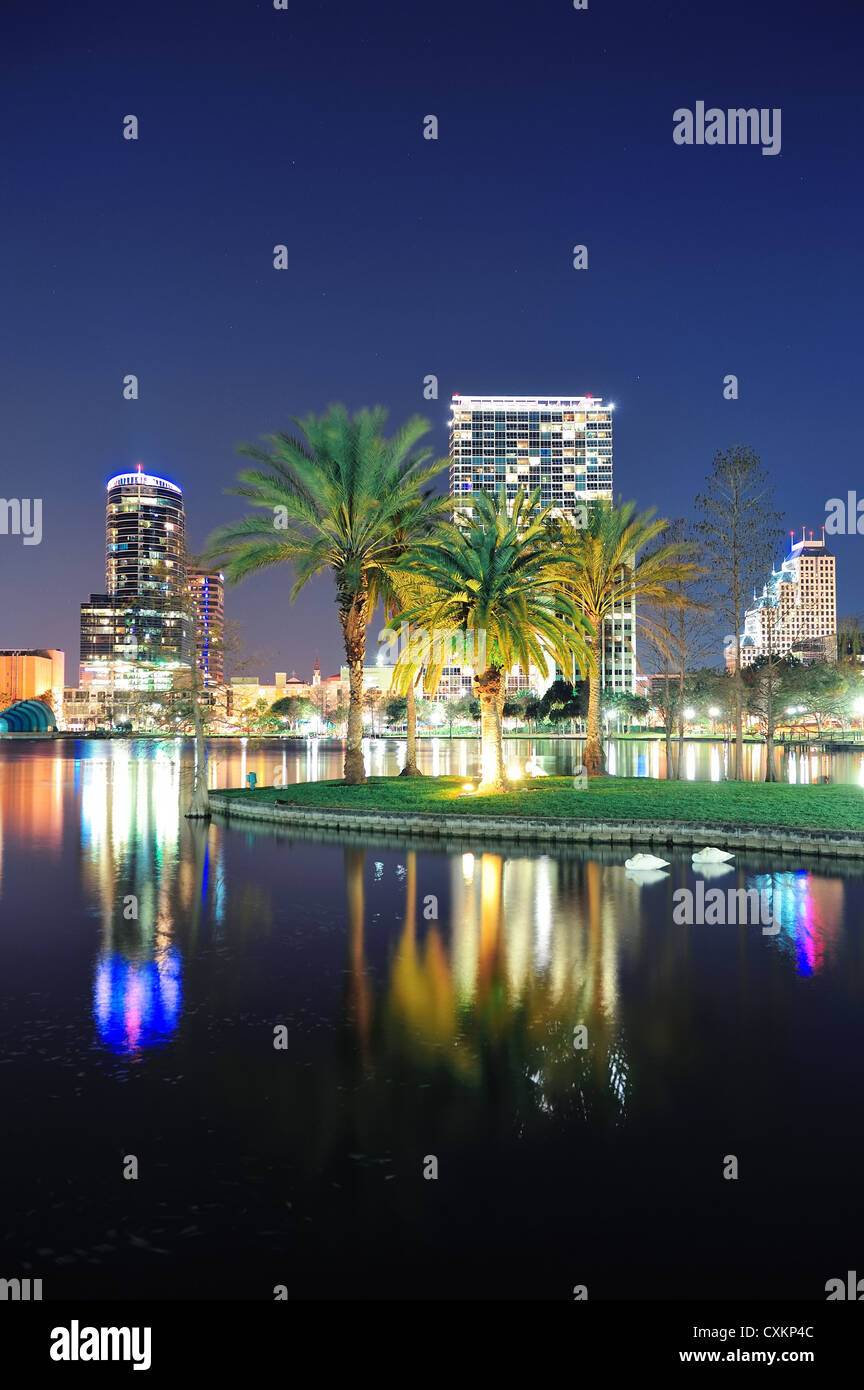 Orlando downtown skyline panorama over Lake Eola at night with urban ...