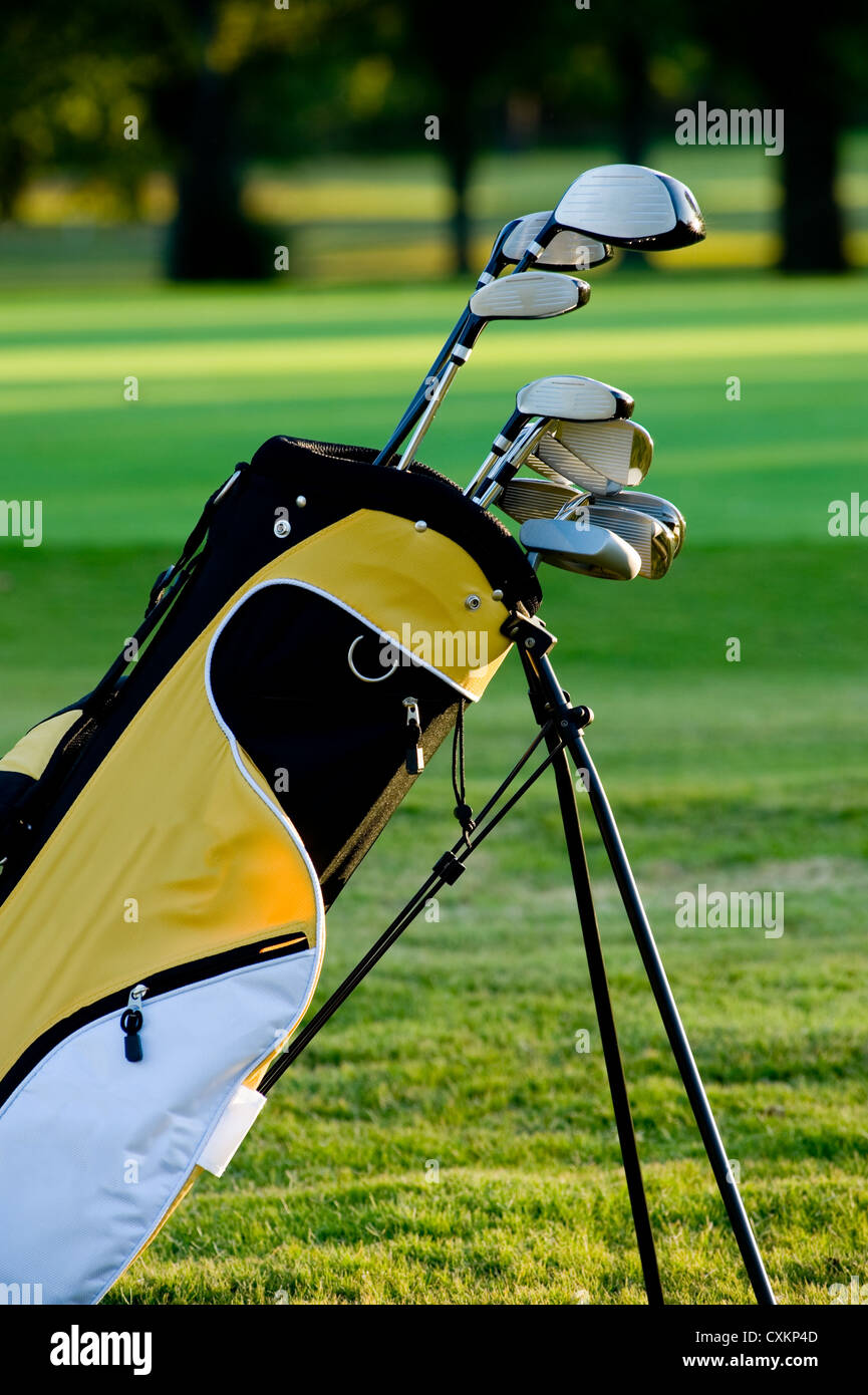 A set up new golf clubs on a beautiful golf course Stock Photo - Alamy
