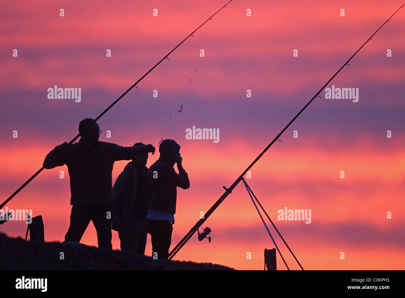 Fisherman at Sunset Stock Photo - Alamy