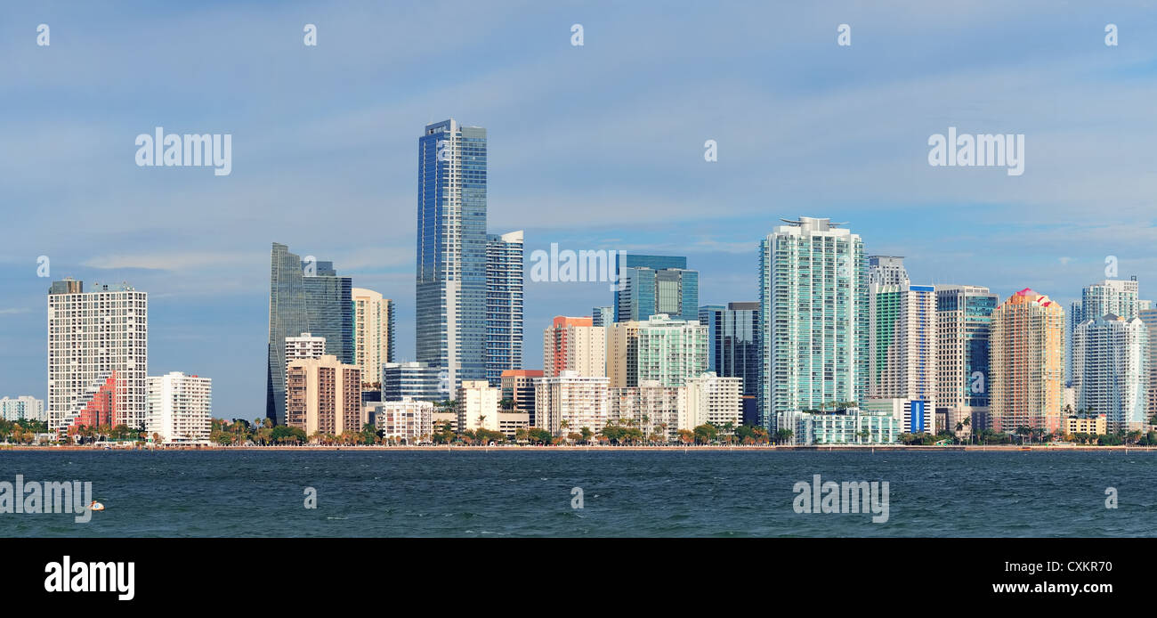 Miami skyline panorama in the day with urban skyscrapers and cloudy sky ...