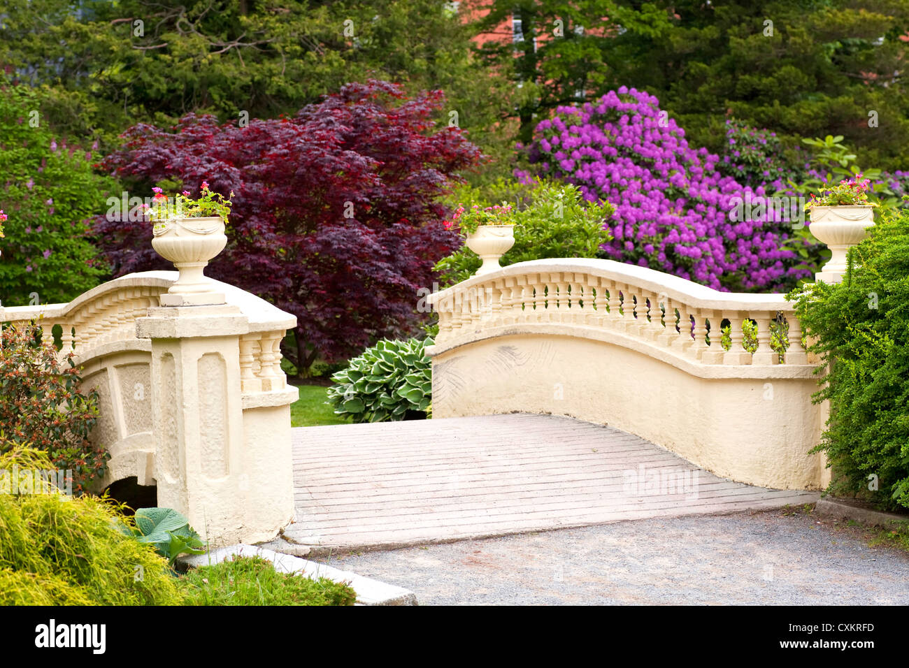 An ornamental pedestrian bridge in a springtime garden in Halifax, Nova ...
