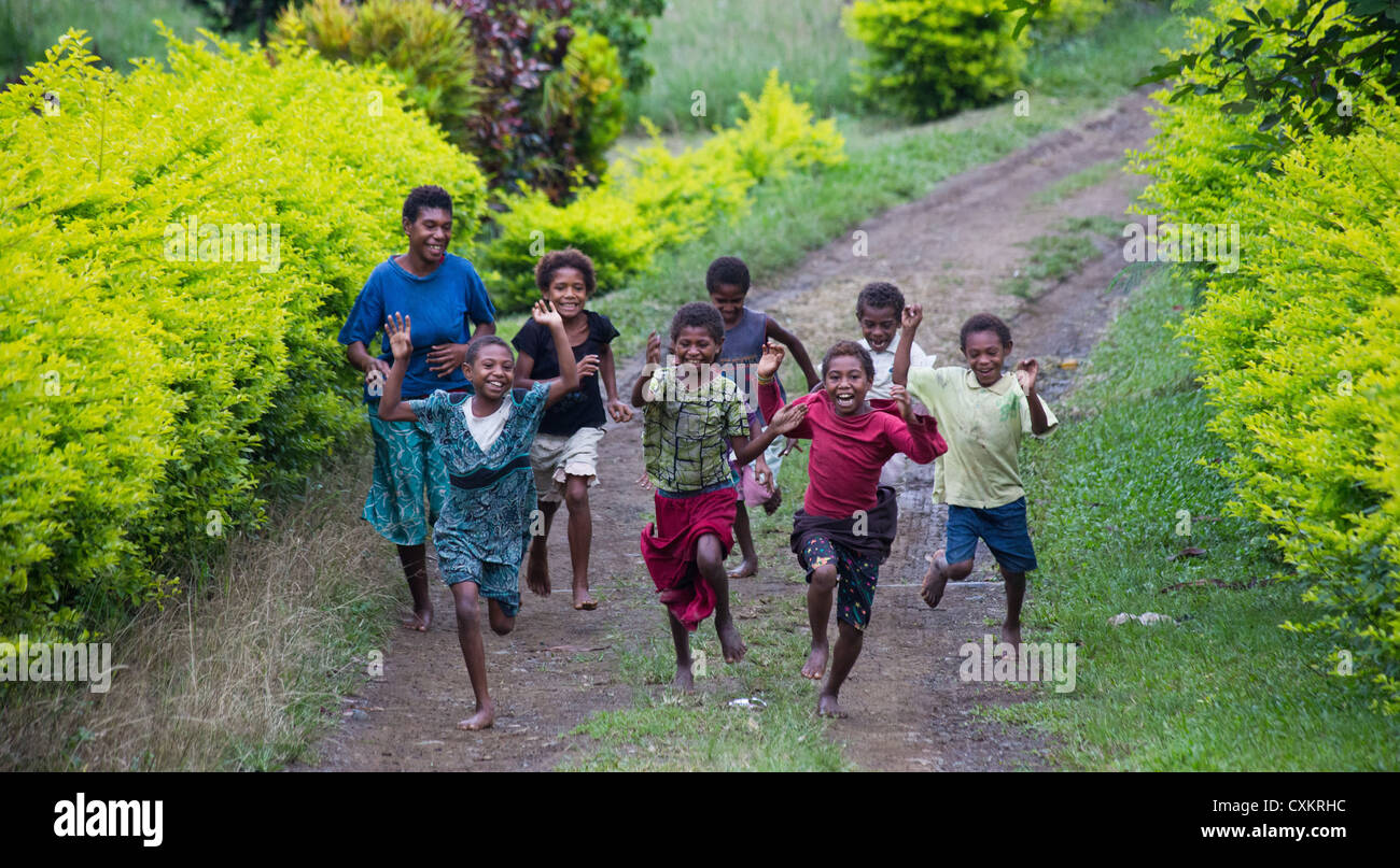 Children running towards camera in a traditional Yonki village, Erap ...