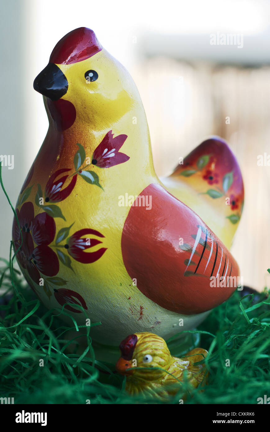 Wooden easter hen with small chicken Stock Photo - Alamy
