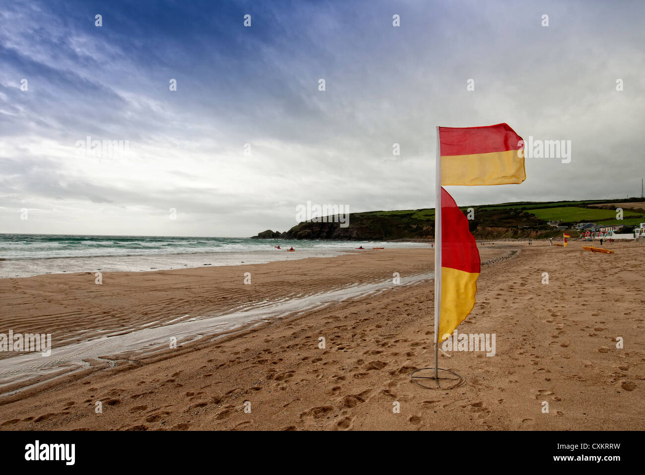 Red and yellow safety flag flags hi-res stock photography and images ...