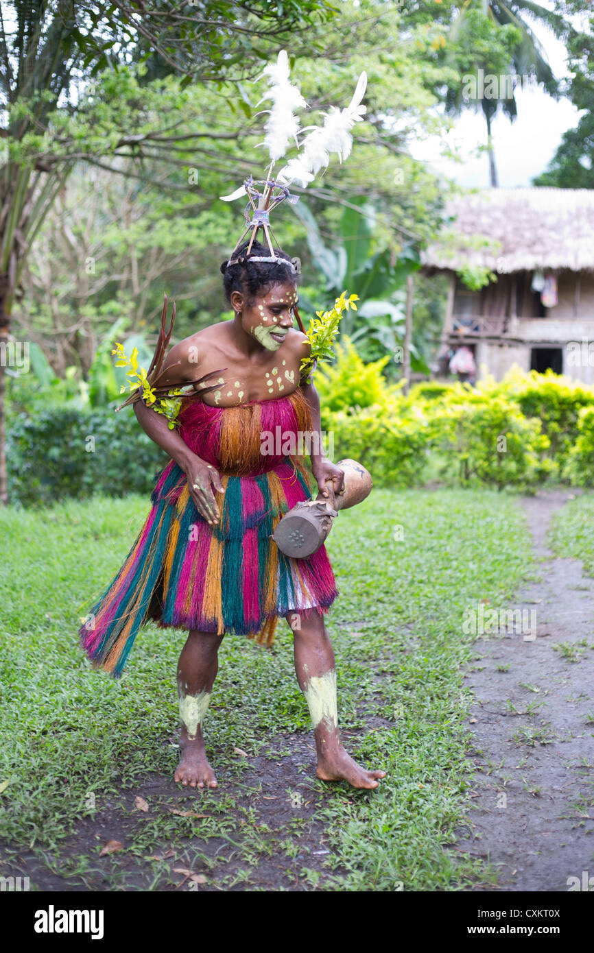 Tribal woman wearing traditional dress in a small village in the Erap ...