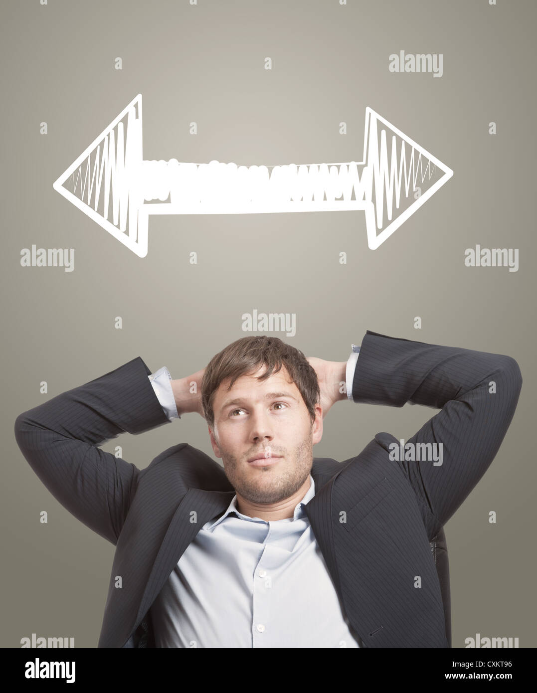Business man in chair thinking with arrows in different directions over ...