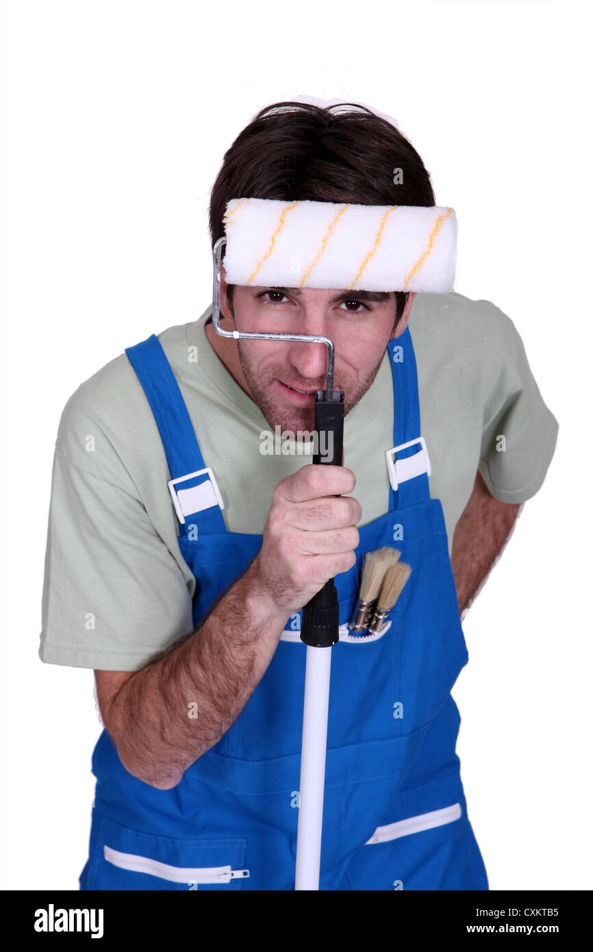 Painter with roller Stock Photo - Alamy