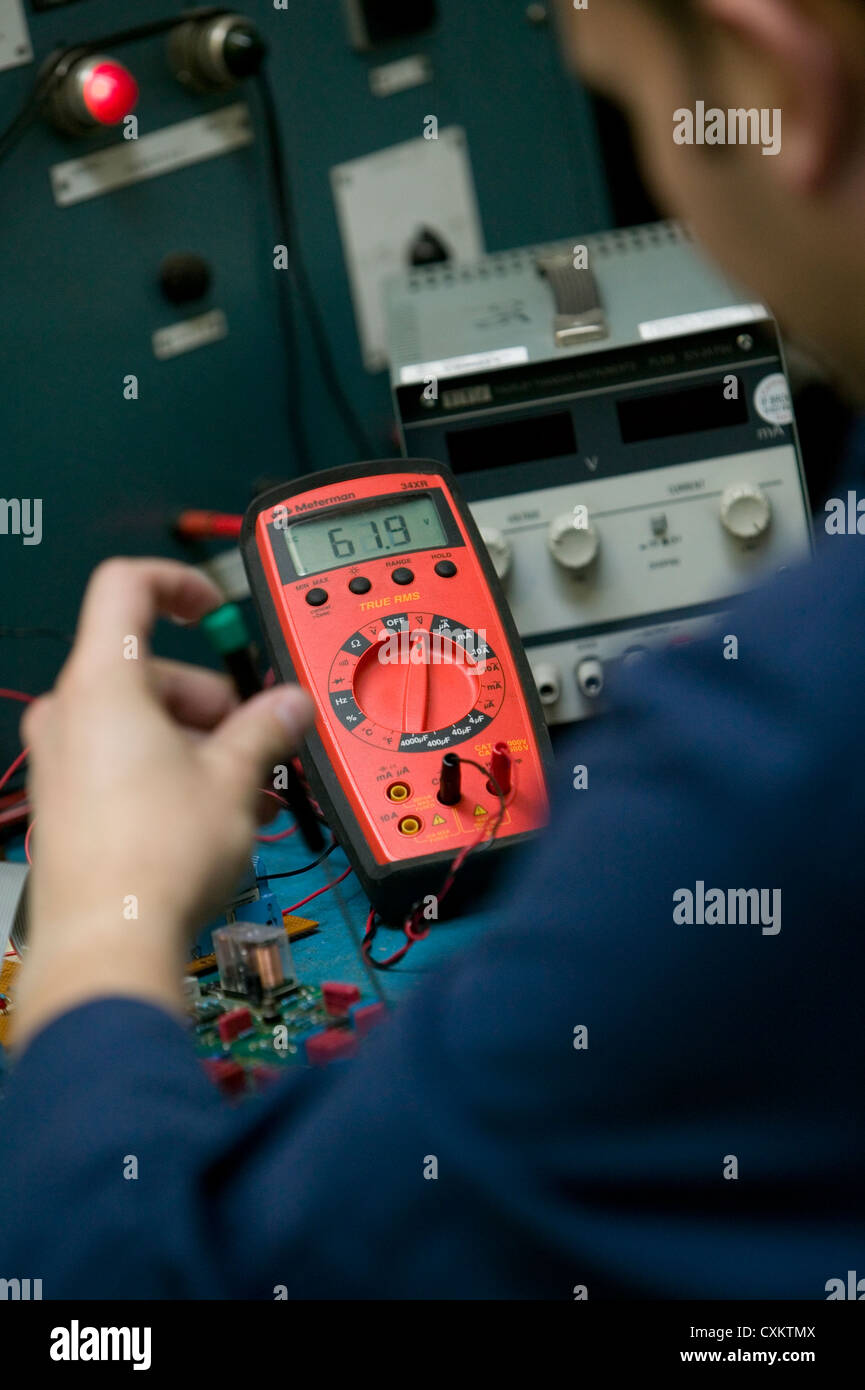 Engineer using electrical testing equipment at Houchin Aerospace ...