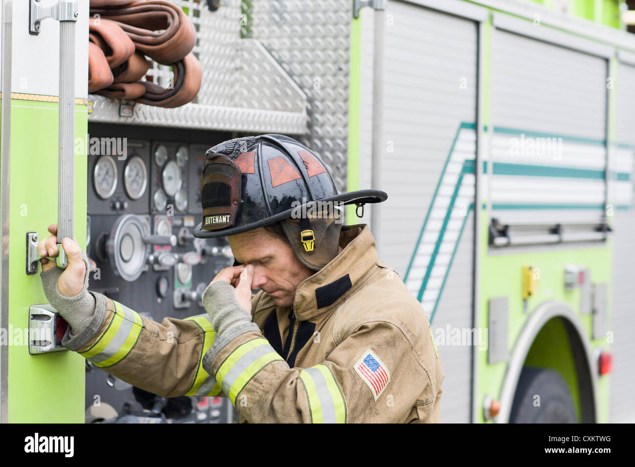 Fireman leaning out hi-res stock photography and images - Alamy