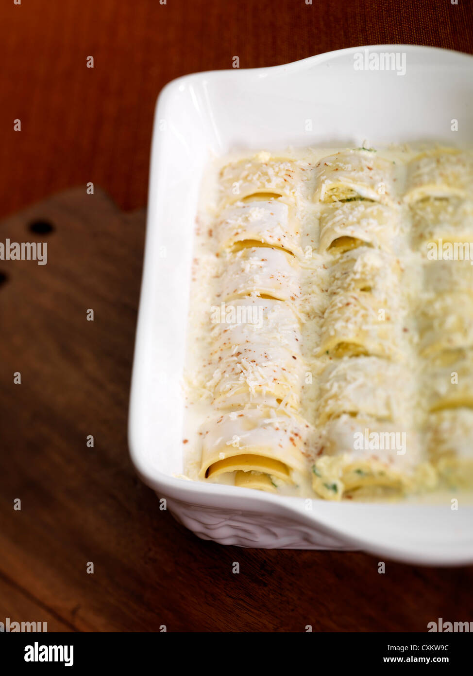 Cheesy Rolled Pasta Dish Stock Photo - Alamy