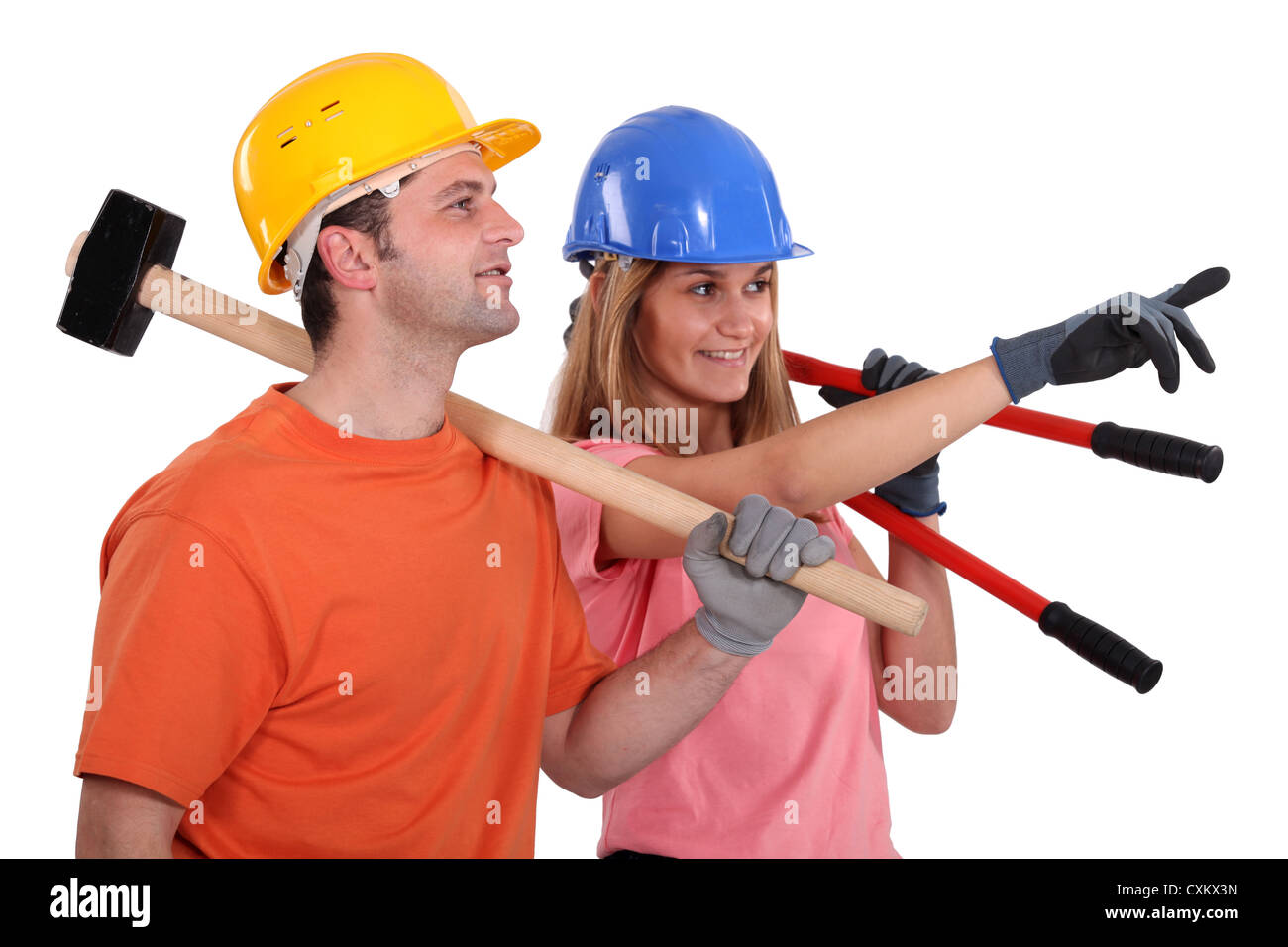 Two builders pointing Stock Photo - Alamy