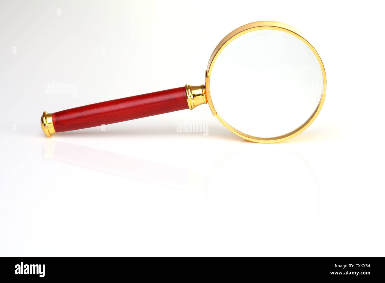 Magnifying glass close-up Stock Photo - Alamy