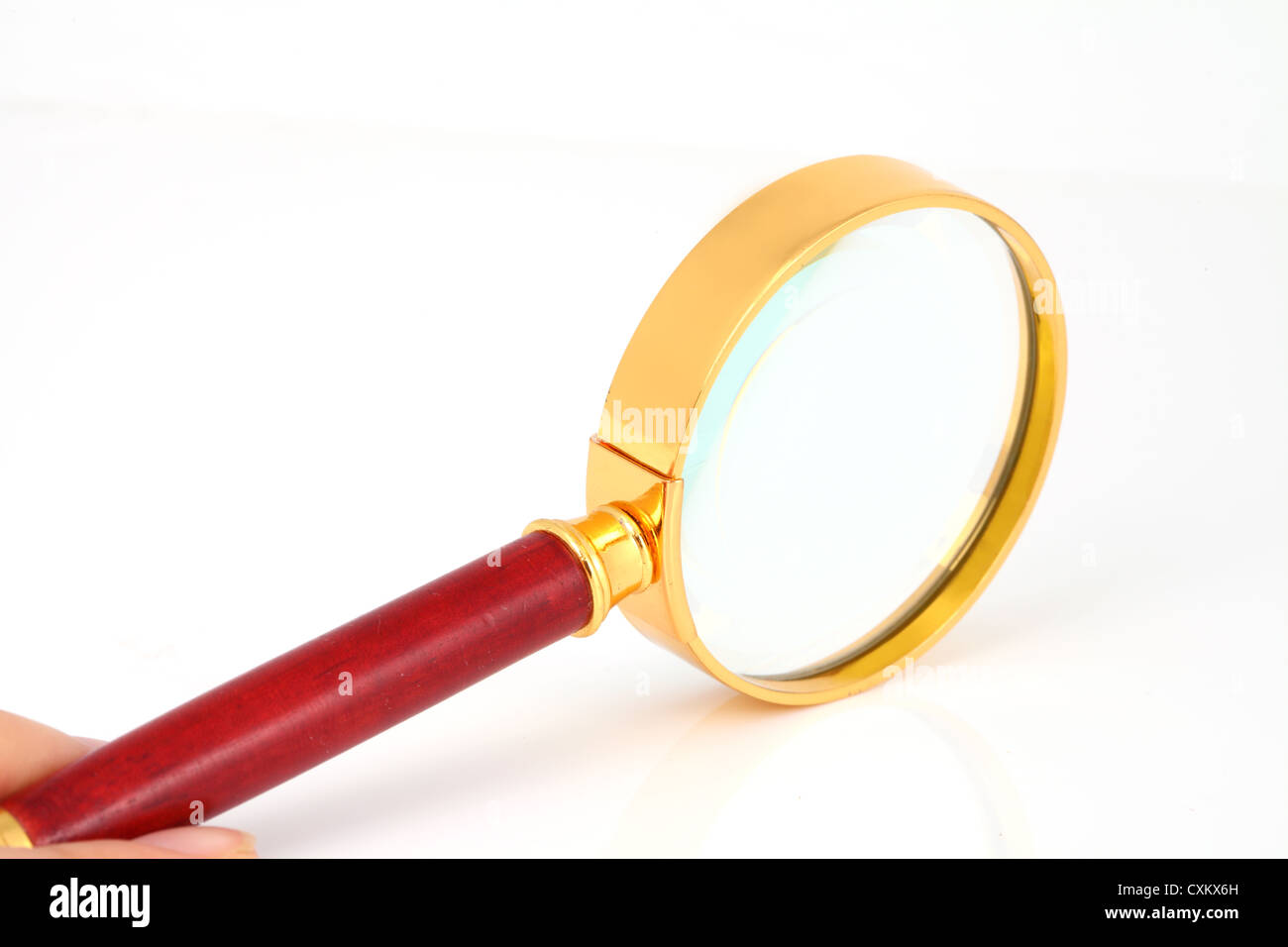 Magnifying glass close-up Stock Photo - Alamy