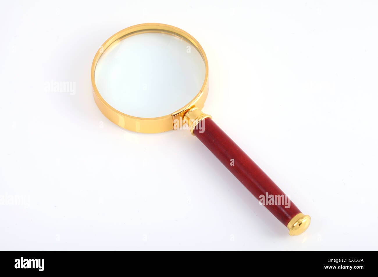 Magnifying glass examining red hi-res stock photography and images - Alamy