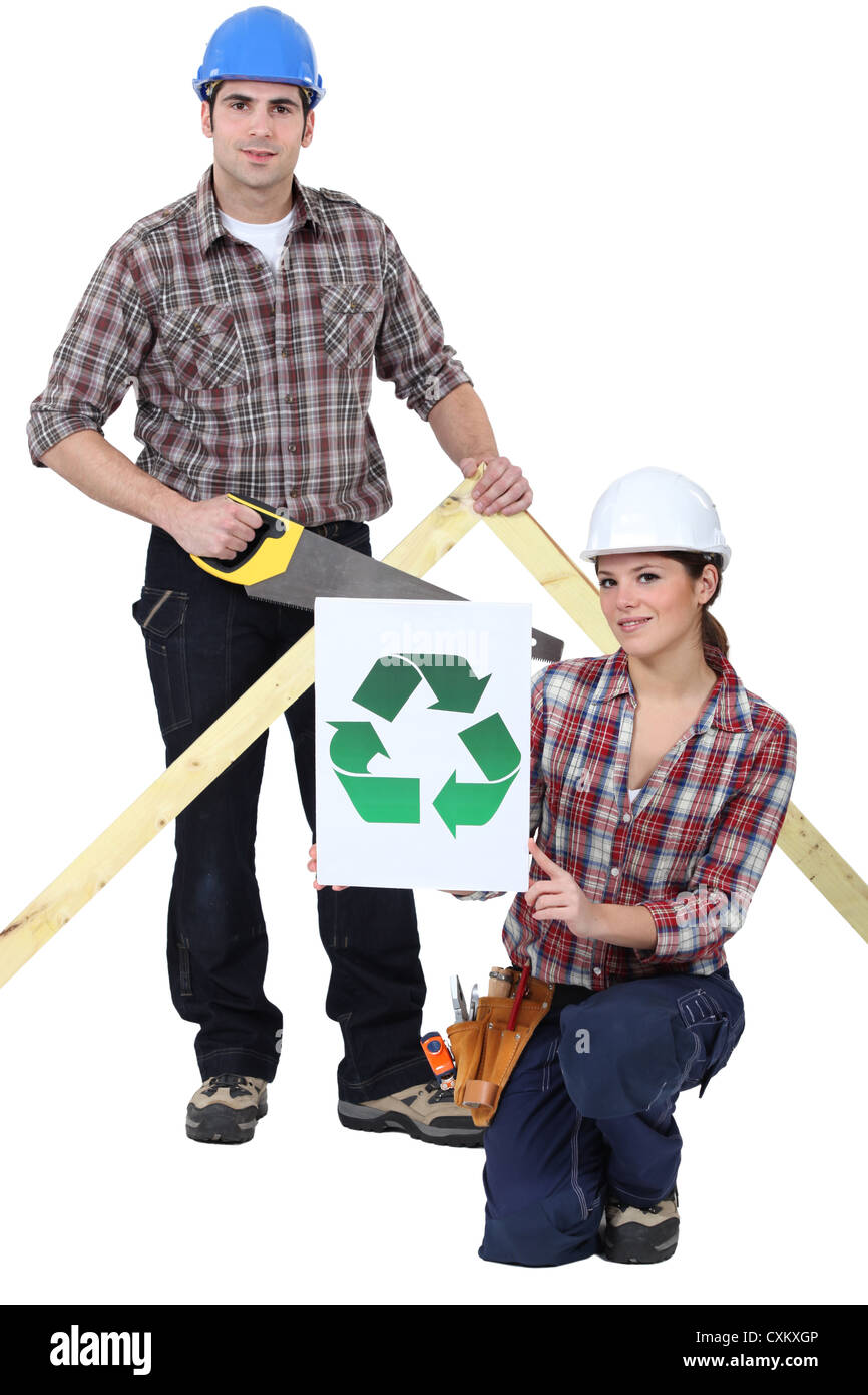 Builders pledging to recycle Stock Photo - Alamy