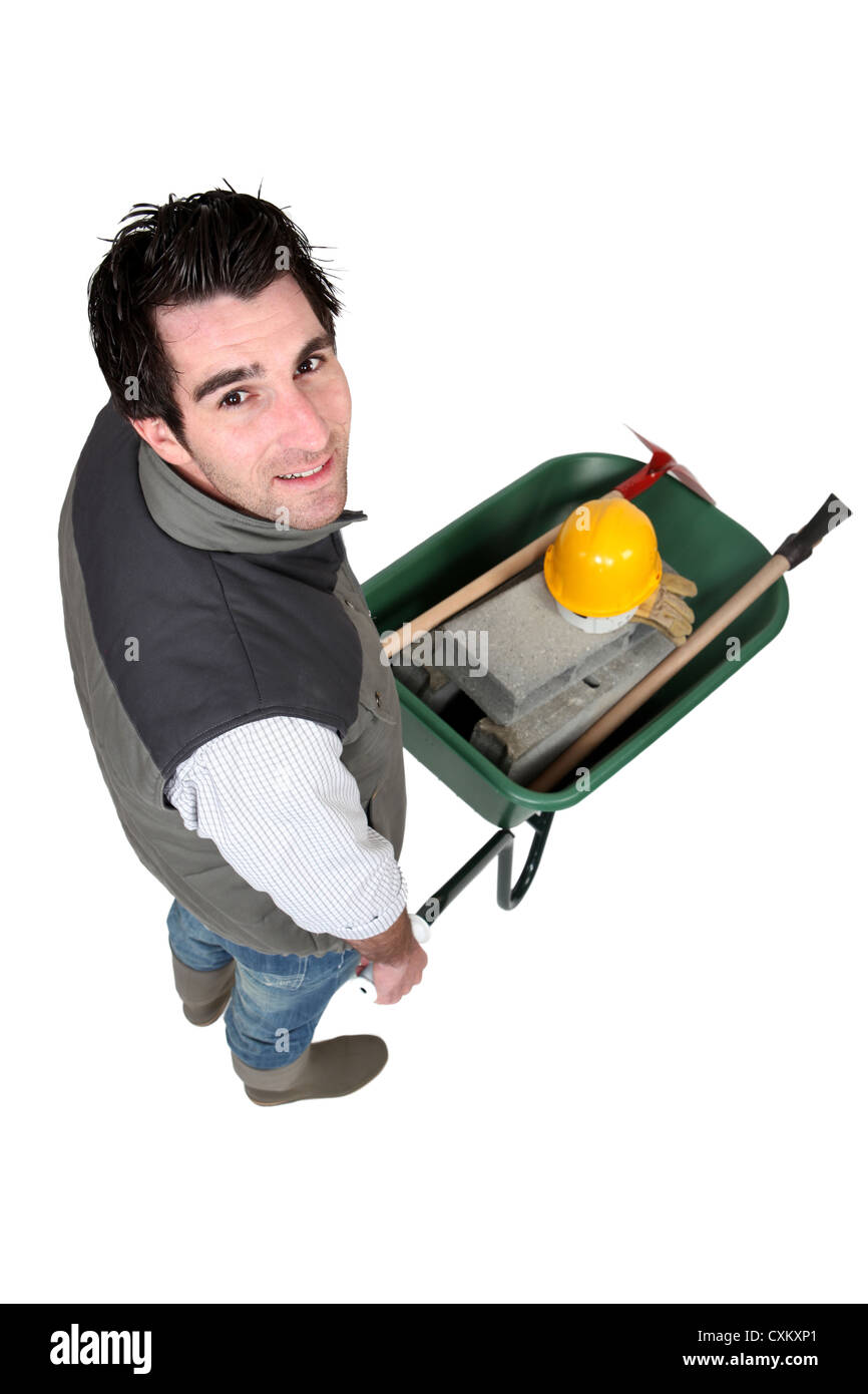 Concrete wheelbarrow Cut Out Stock Images & Pictures - Alamy