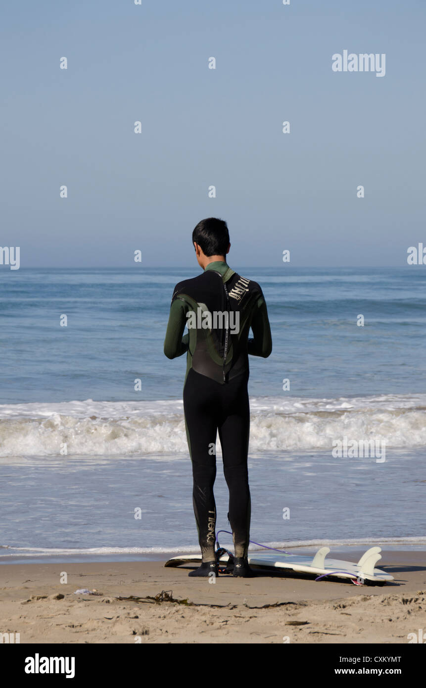 California, Pacific Coast, Pismo Beach. Surfer on Pismo State Beach ...