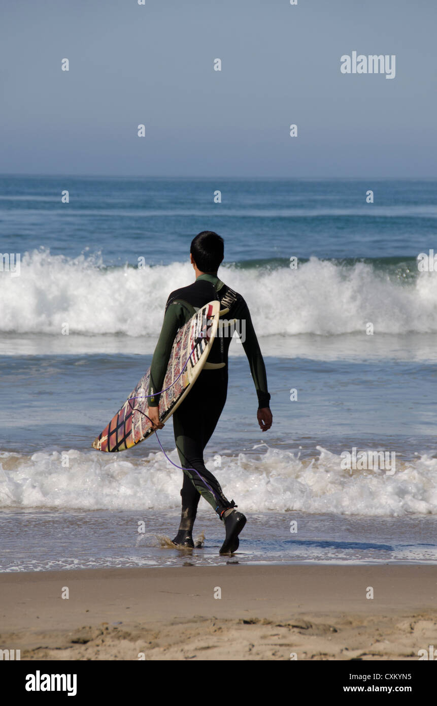 California, Pacific Coast, Pismo Beach. Surfer on Pismo State Beach ...