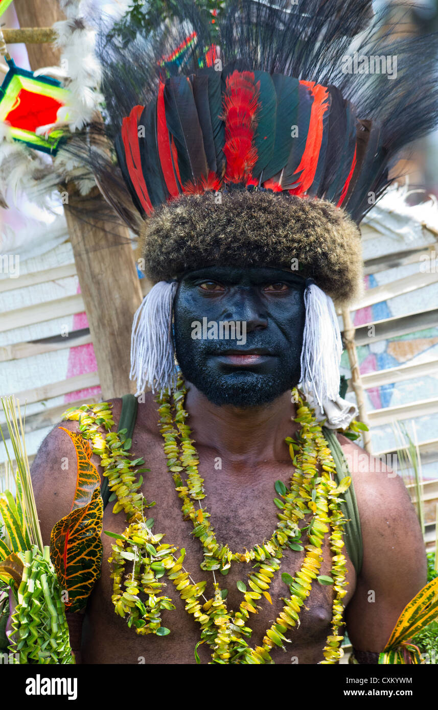 Portrait of a man dressed in traditional tribal outfit for the Goroka ...