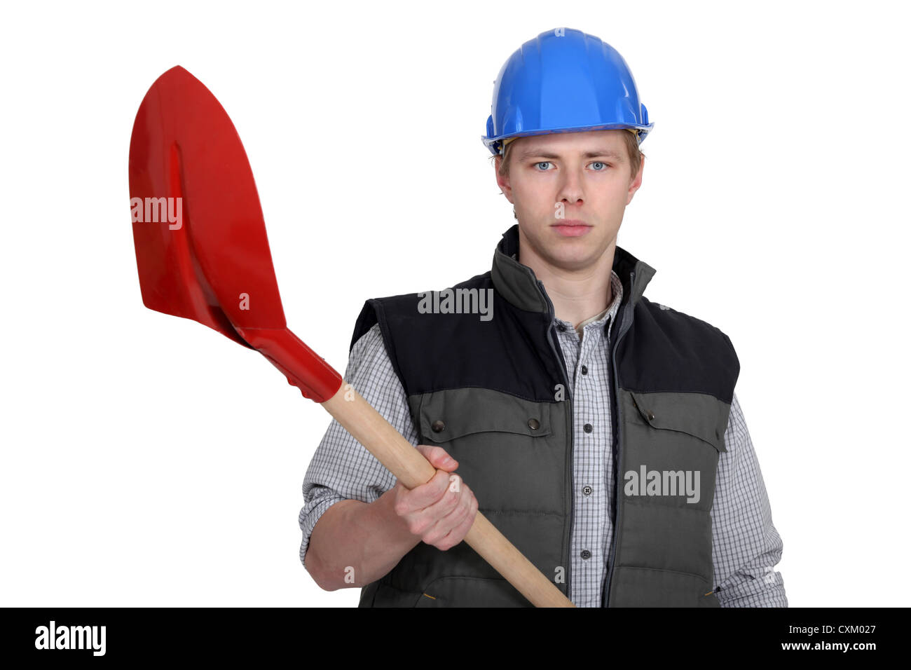 A man with a shovel Stock Photo - Alamy