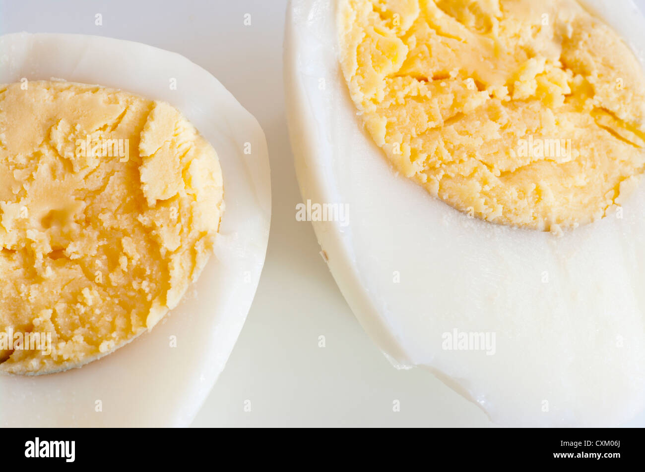 2 Halves Of A Peeled Boiled Egg Stock Photo - Alamy