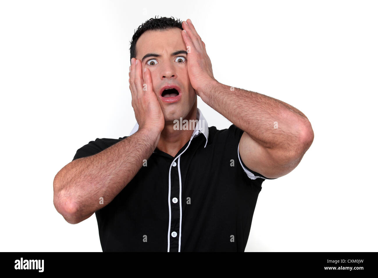 Man with shocked look on face Stock Photo - Alamy