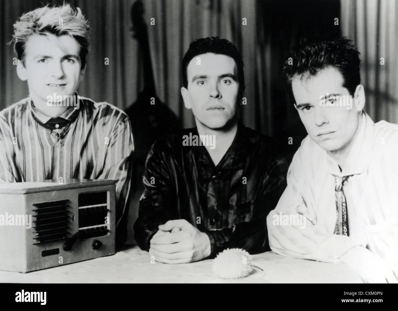 CROWDED HOUSE Promotional photo of UK pop trio in 1987. From l: Neil ...