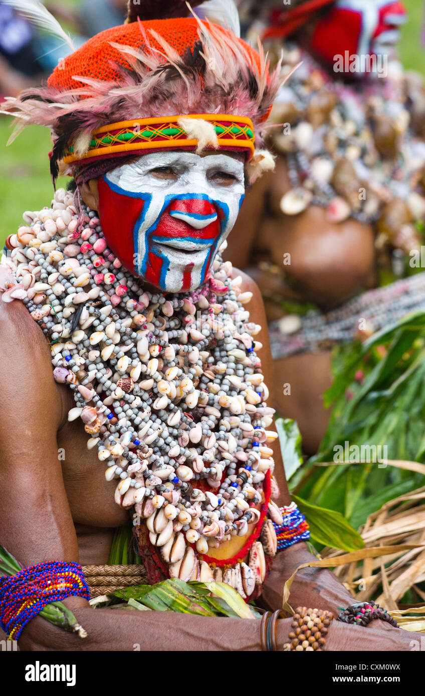 Woman dressed in traditional tribal costume and headdress at the ...