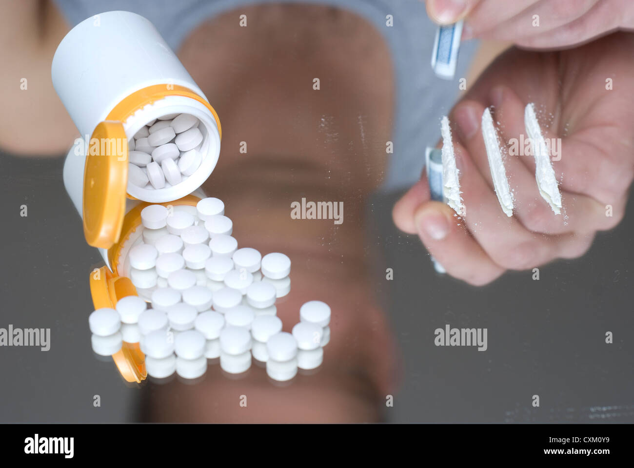 Narcotics abuse. Substances on a mirror, blurry effect background Stock ...