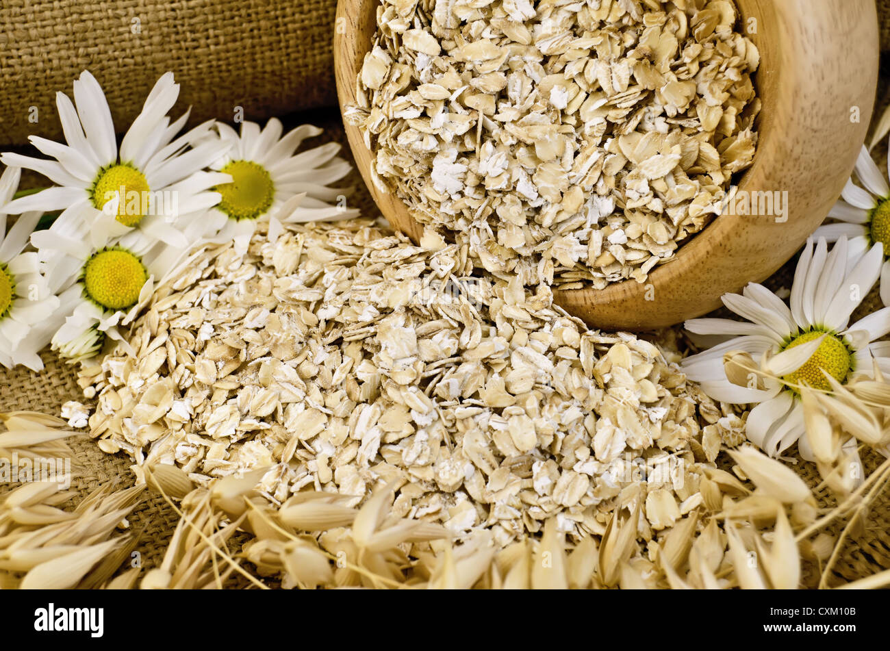 Oat flakes on sackcloth hi-res stock photography and images - Alamy