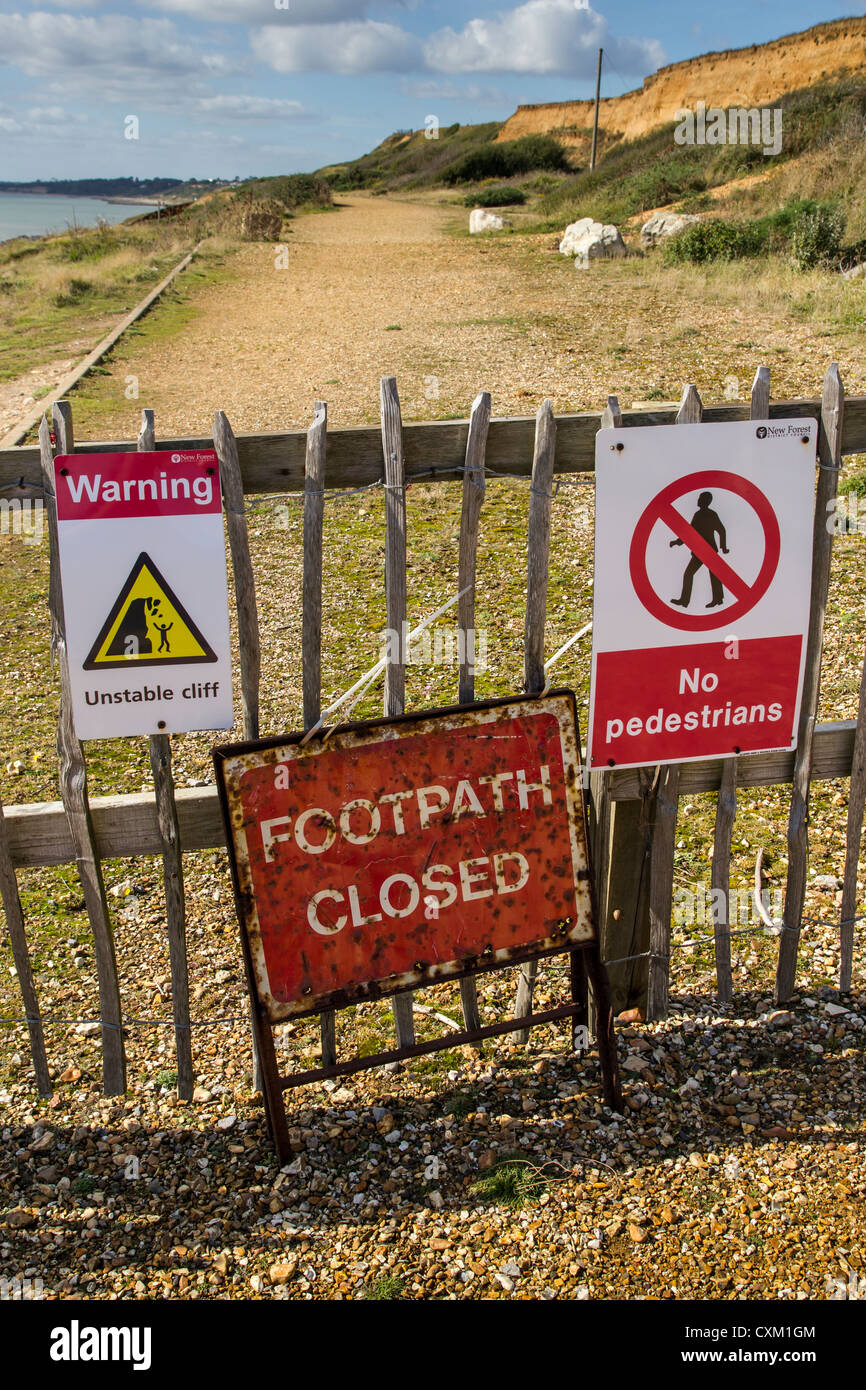 Warning Unstable cliff footpath closed and no pedestrians signs at ...