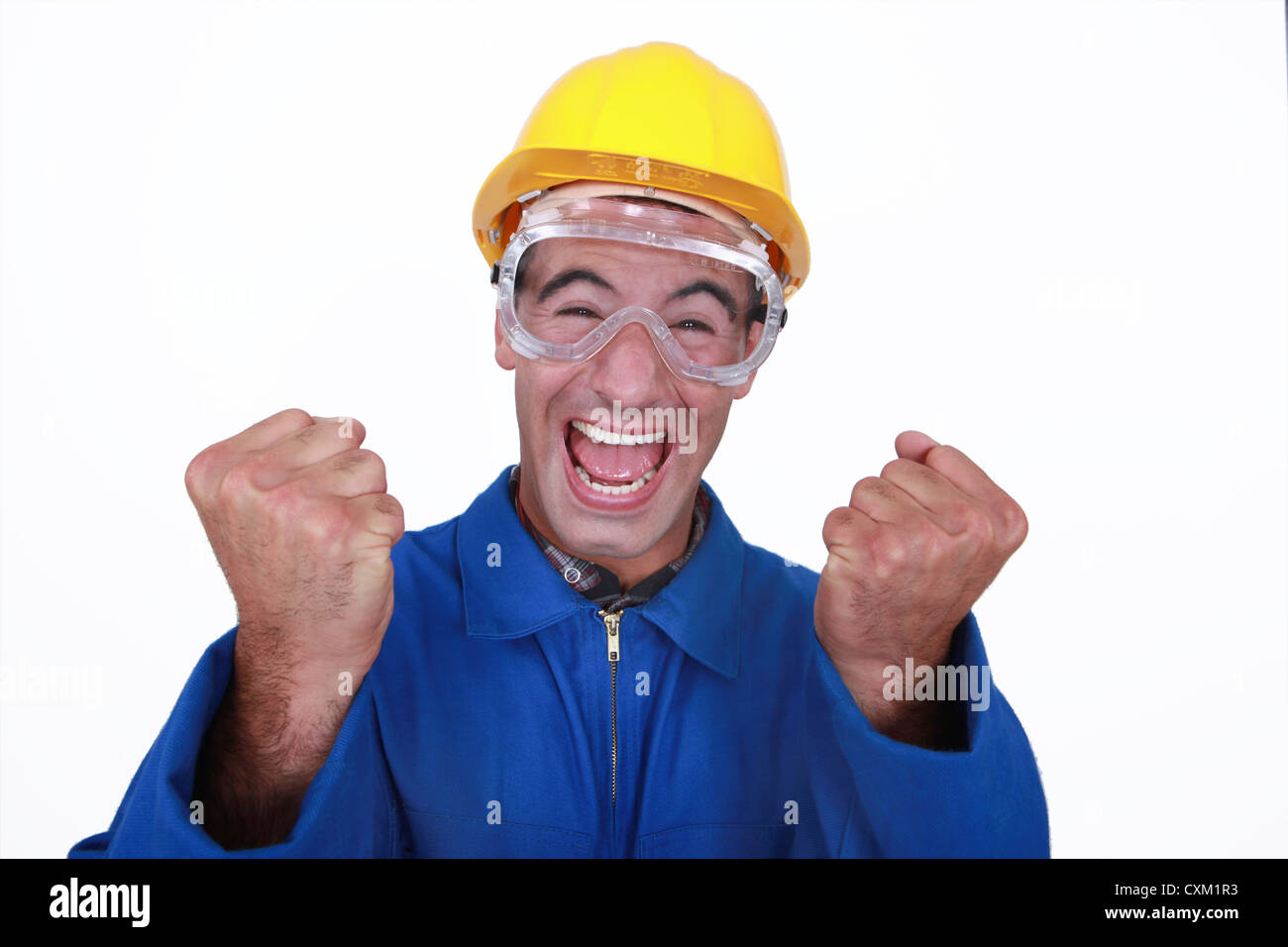 An ecstatic construction worker Stock Photo - Alamy