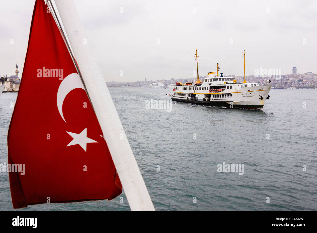 Turkey, Istanbul. Passenger ferry sailing on Bosphorus with Turkish ...