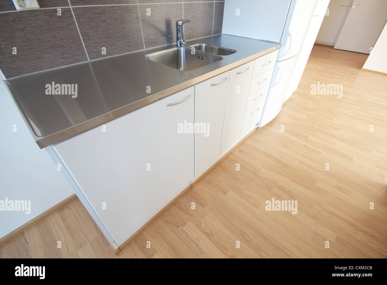 Beautiful empty kitchen in a brand new house Stock Photo - Alamy