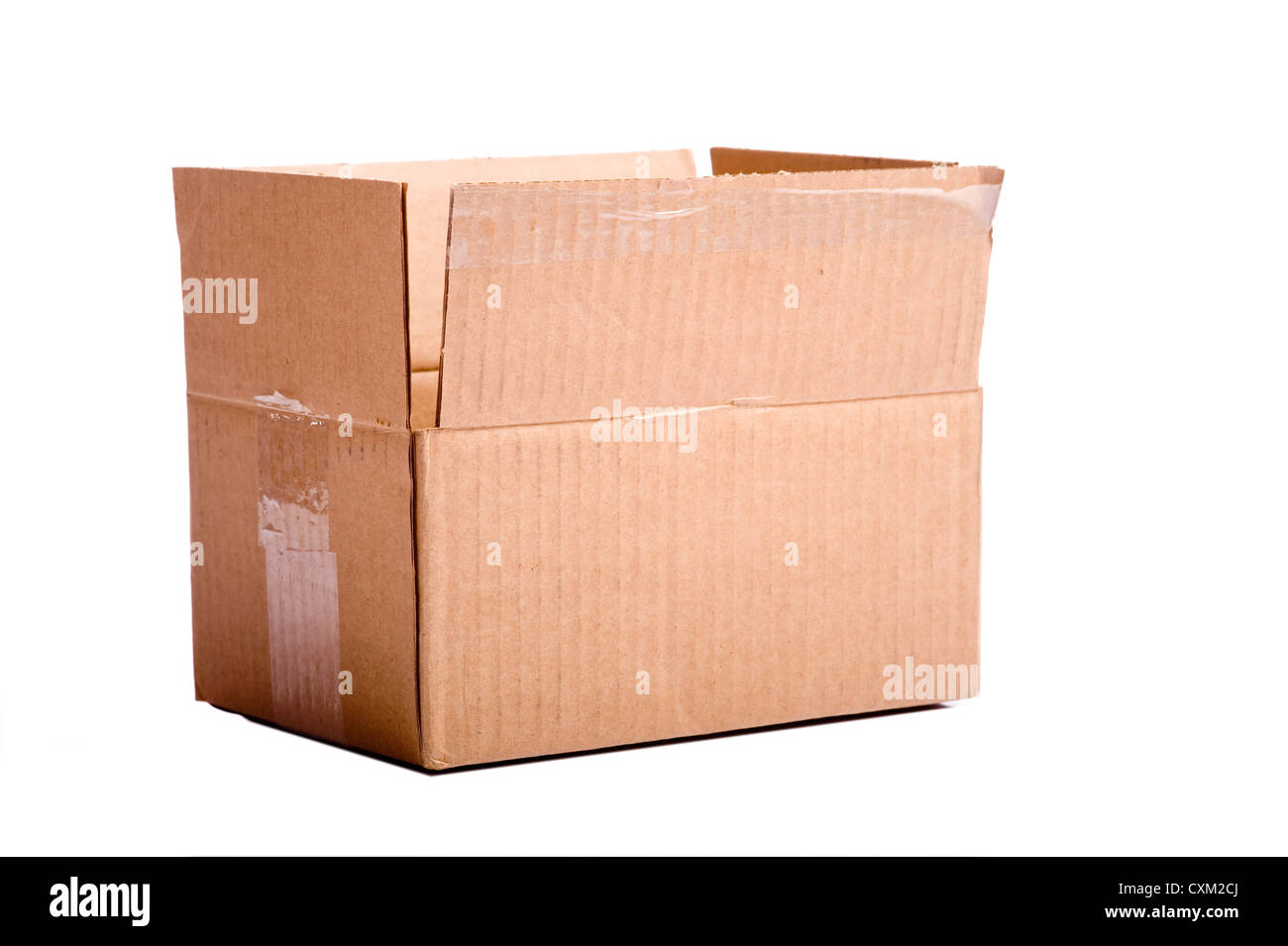 Brown corrugated cardboard shipping box on a white background with copy ...